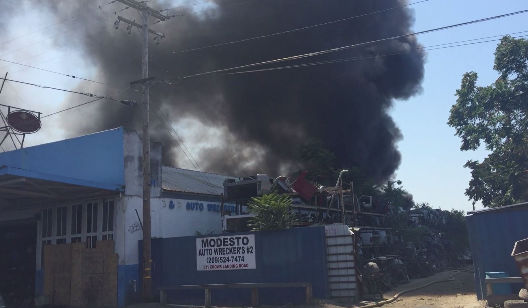 4 firefighters sent to hospital as crews battle large fire in Modesto ...